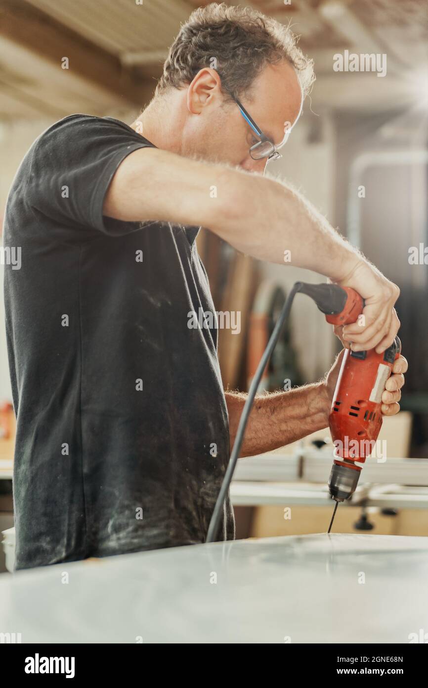 Large hand drill hi-res stock photography and images - Alamy