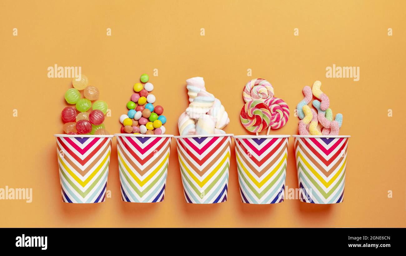 flat lay delicious colorful candies. High quality and resolution ...