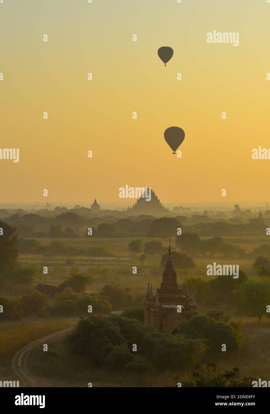 Beautiful sunrise scene in Bagan (Myanmar) with a complex of ancient ...