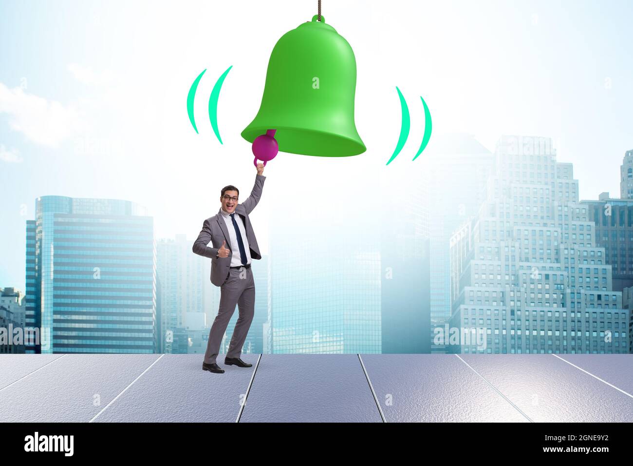 Businessman ringing the bell in case of the danger Stock Photo - Alamy