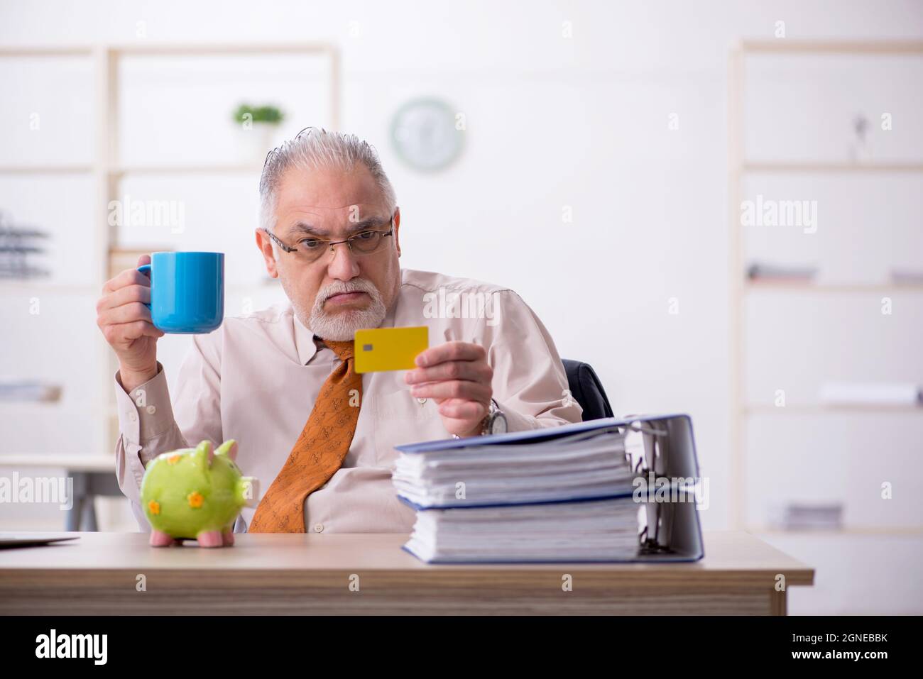 Old businessman employee in retirement concept Stock Photo - Alamy