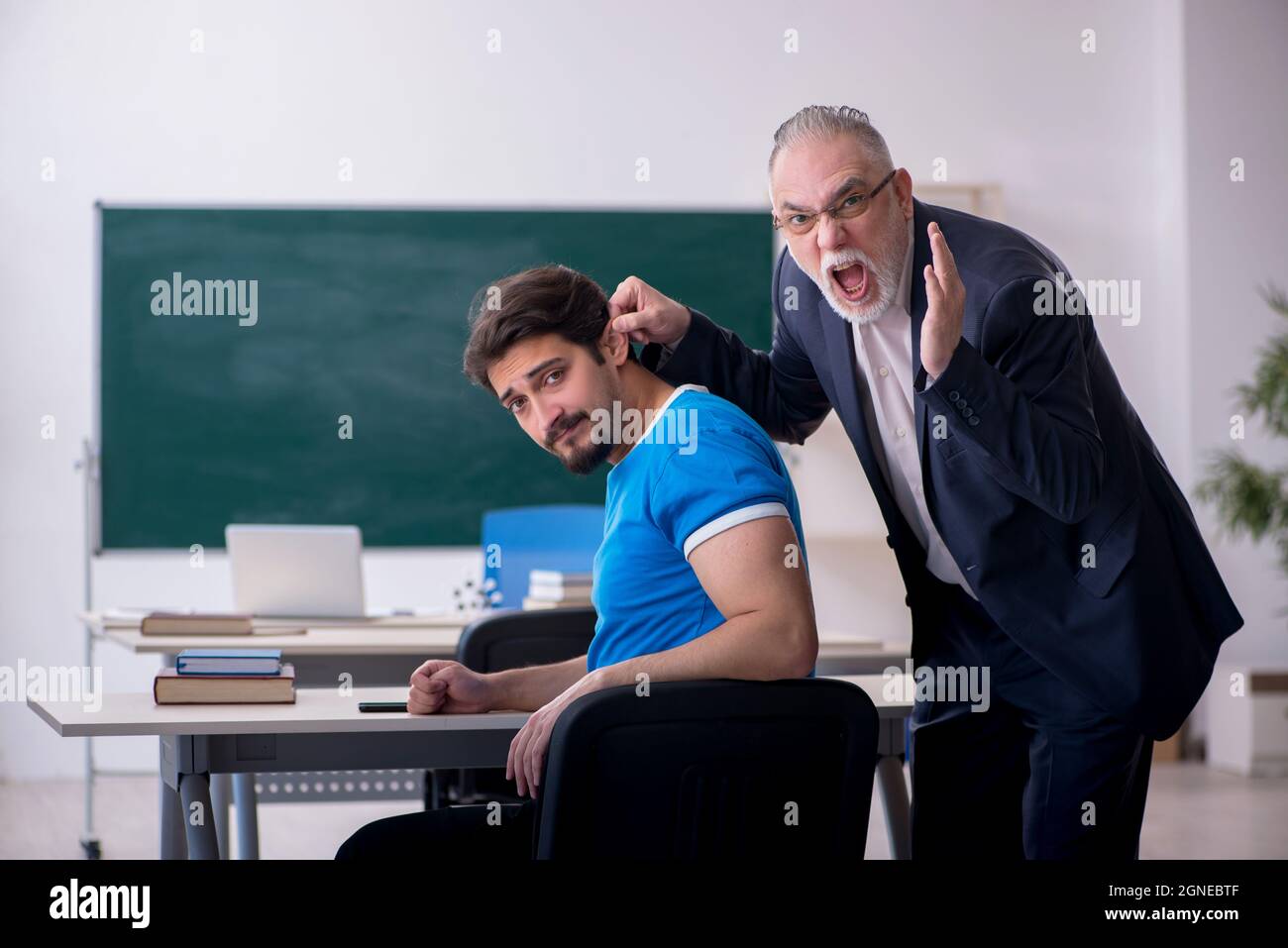 Teacher humiliating student hi-res stock photography and images - Alamy