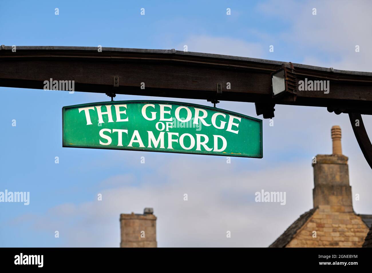 Sign over the main road for the George inn, Stamford, England Stock ...