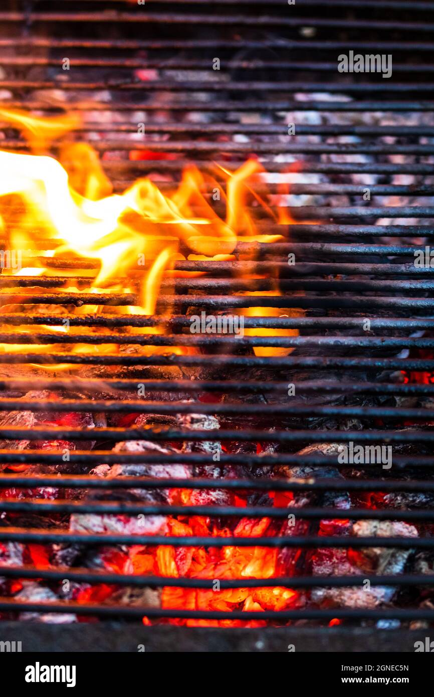 Empty hot charcoal barbecue grill with bright flame Stock Photo - Alamy