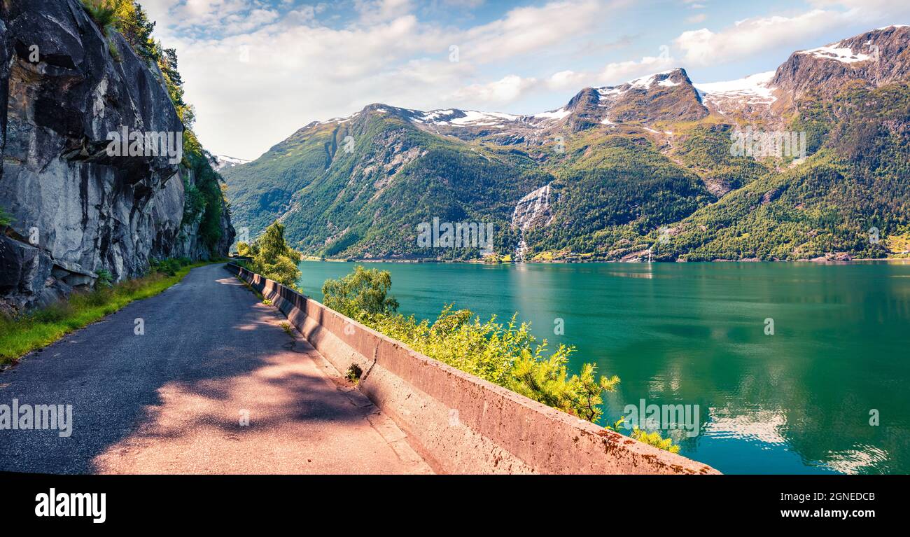 Sunny summer scene ofLofthus village in Ullensvang municipality which ...