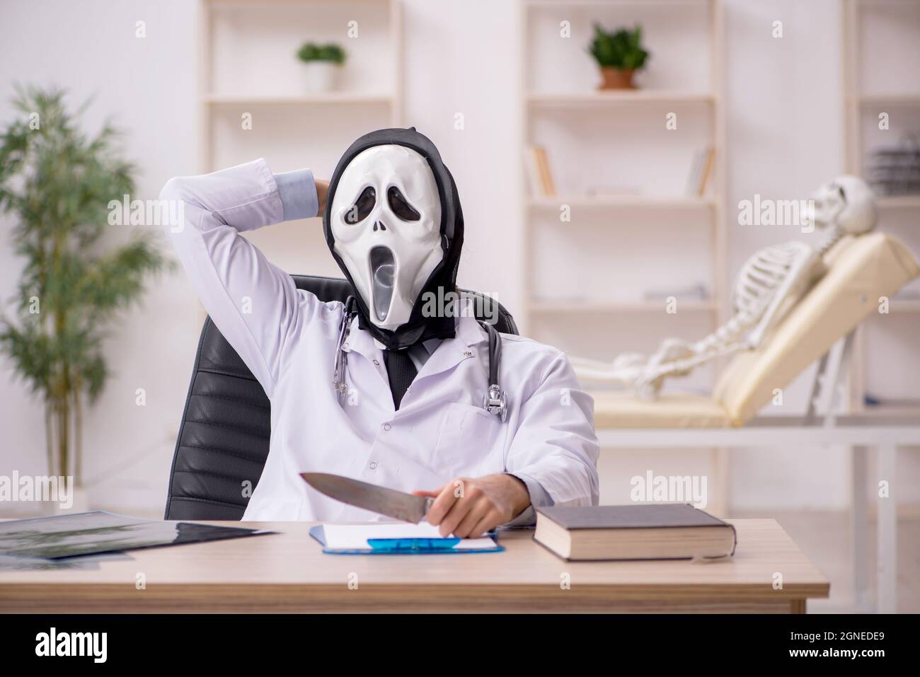 Devil doctor working at the hospital Stock Photo - Alamy