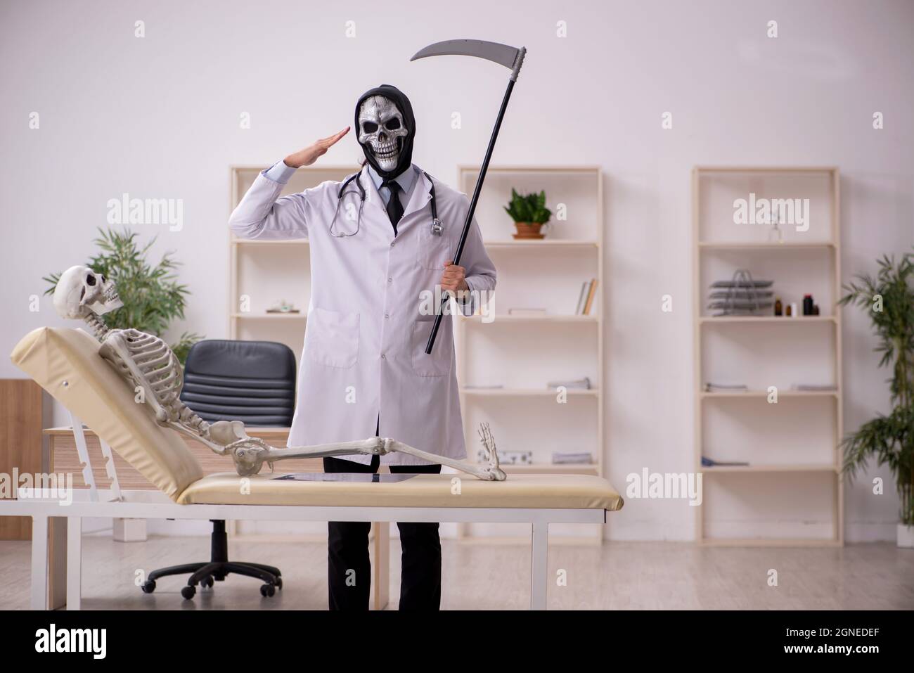 Reaper grim doctor examining skeleton patient in the clinic Stock Photo ...