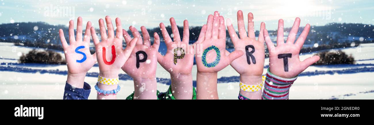Children Hands Building Word Support, Snowy Winter Background Stock Photo - Alamy
