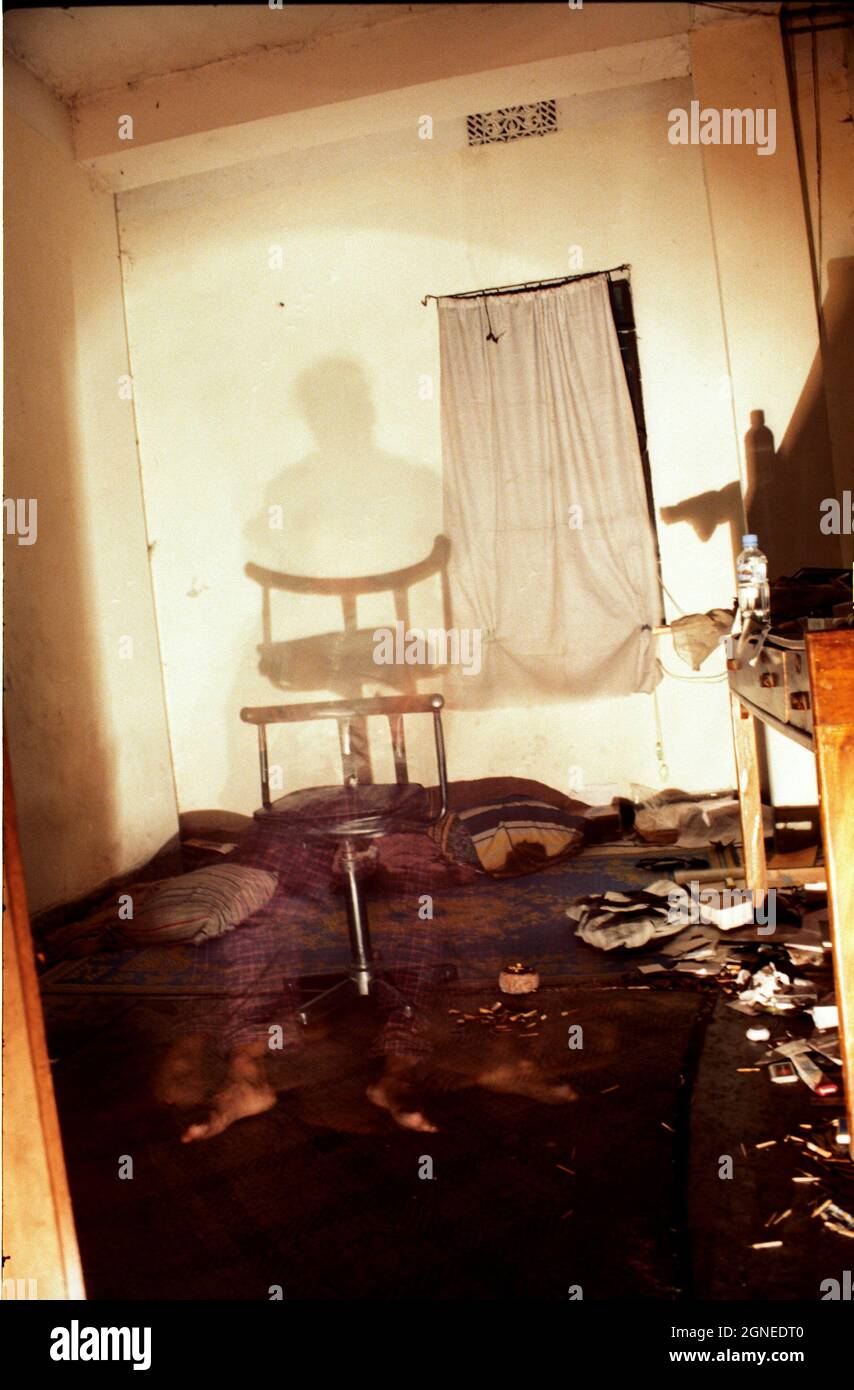 A messed up room with Cigarette buds all over the floor. Bangladesh ...
