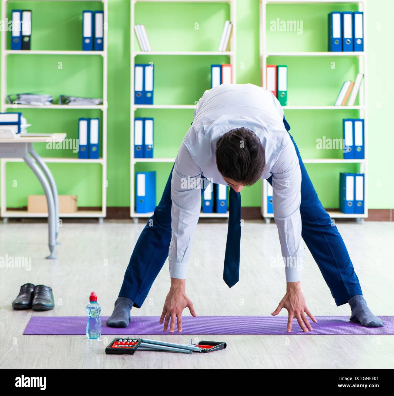 The employee doing exercises during break at work Stock Photo - Alamy