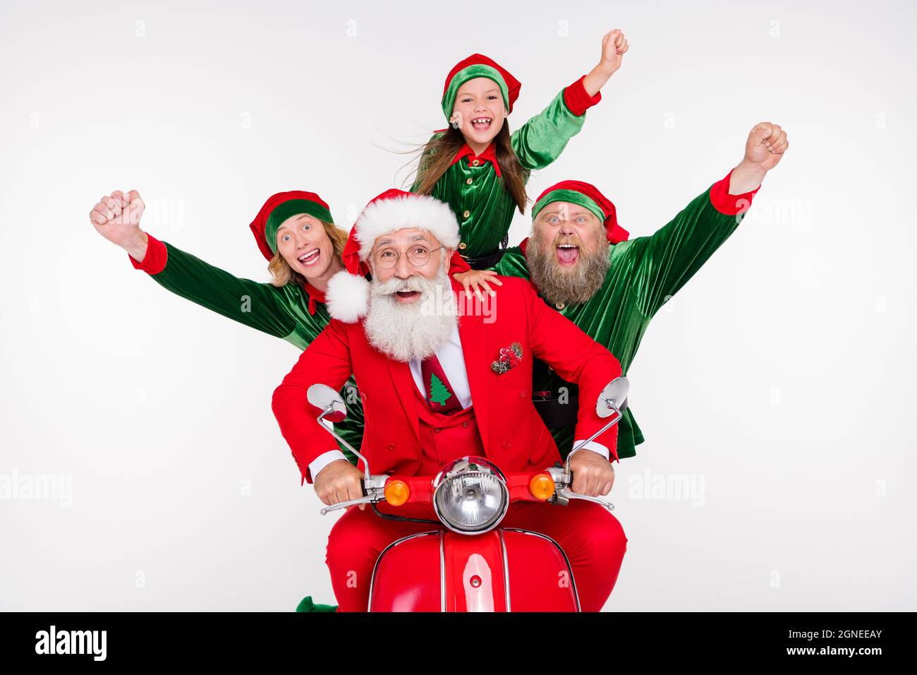 Portrait of attractive lucky cheerful friends riding motor bike having ...