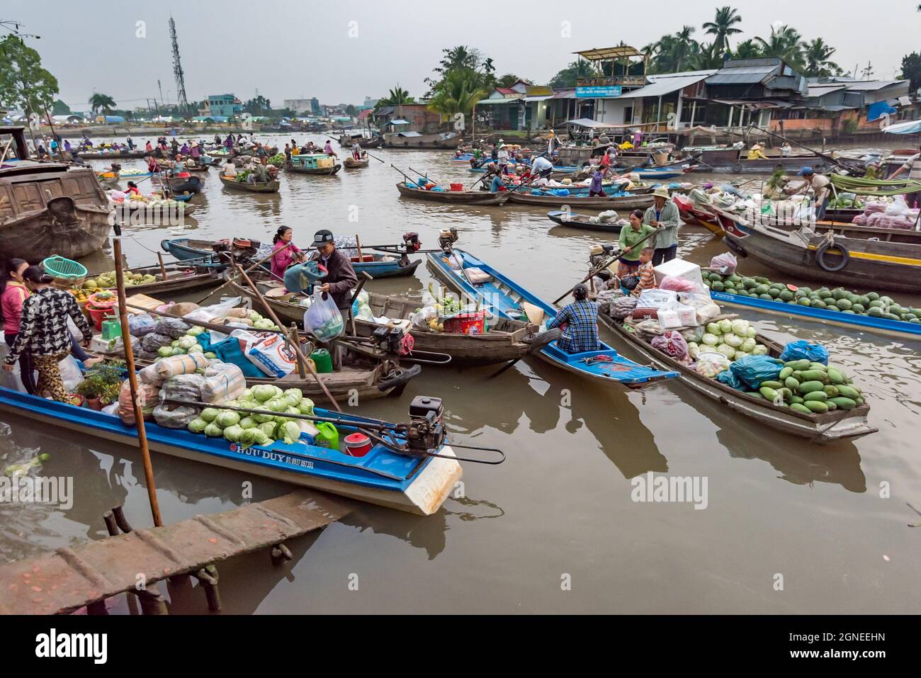 Aerial view of Phong Dien floating market at sunrise, boats selling ...