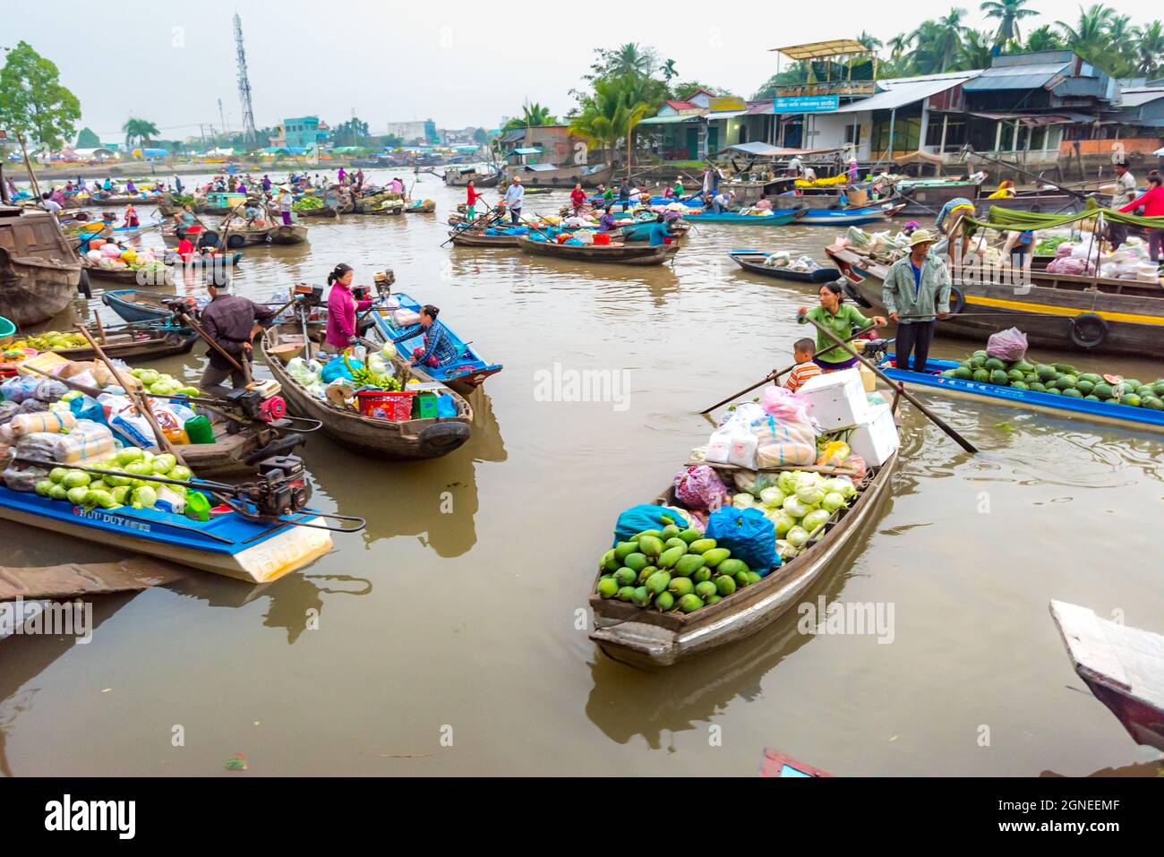 Aerial view of Phong Dien floating market at sunrise, boats selling ...