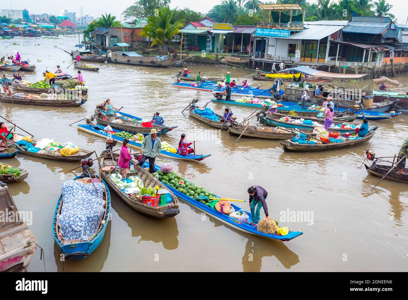 Aerial view of Phong Dien floating market at sunrise, boats selling ...
