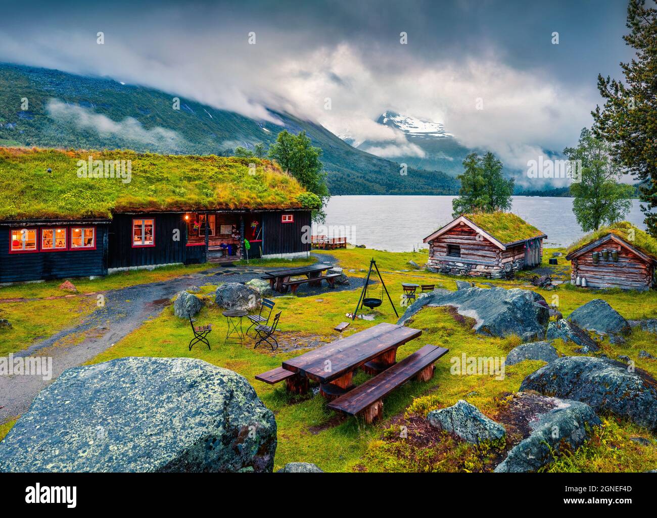 Norwegian typical grass roof wooden old house on the Innerdalsvatna ...