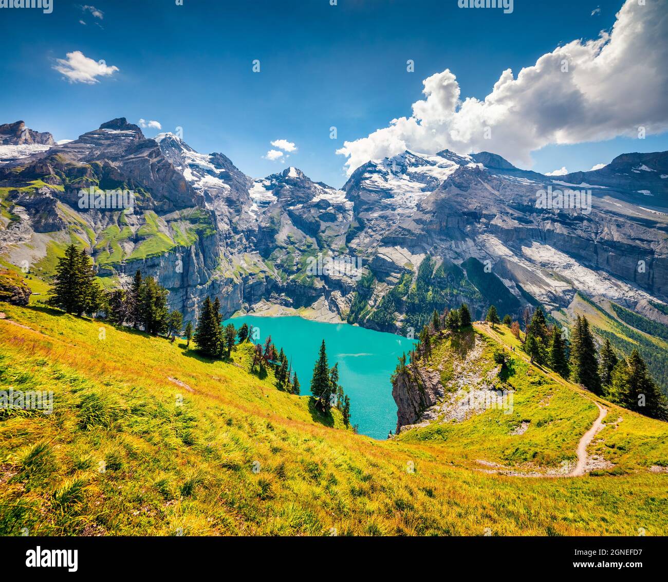 Great summer morning on the unique Oeschinensee Lake. Splendid outdoor ...