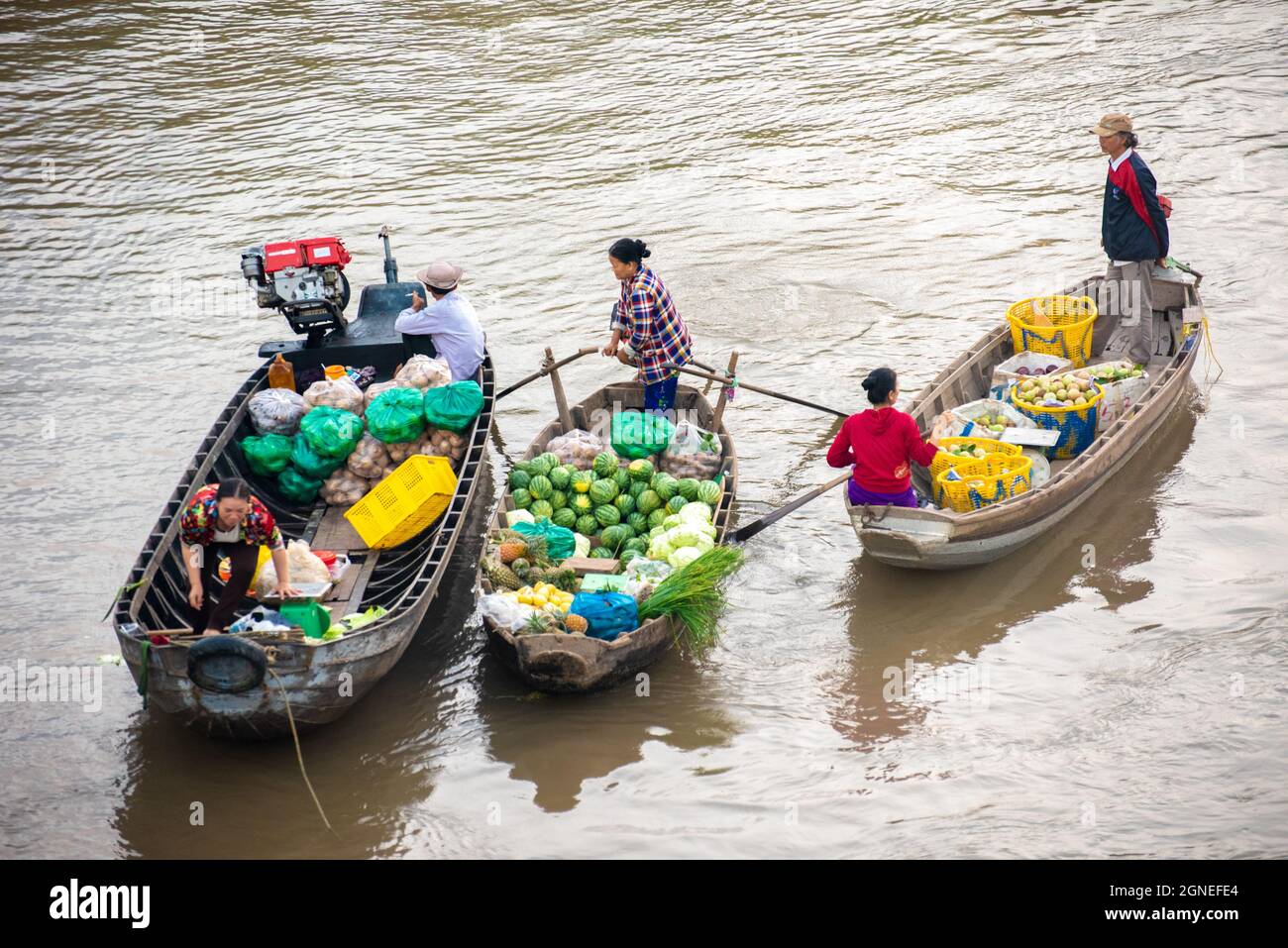Aerial view of Phong Dien floating market at sunrise, boats selling ...