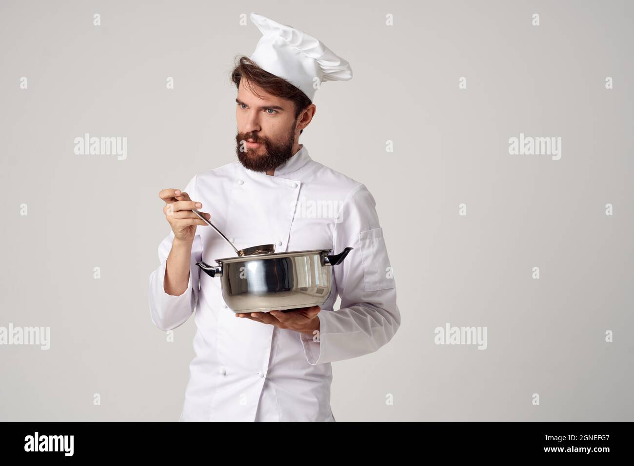 male chef gourmet restaurant cooking light background Stock Photo - Alamy