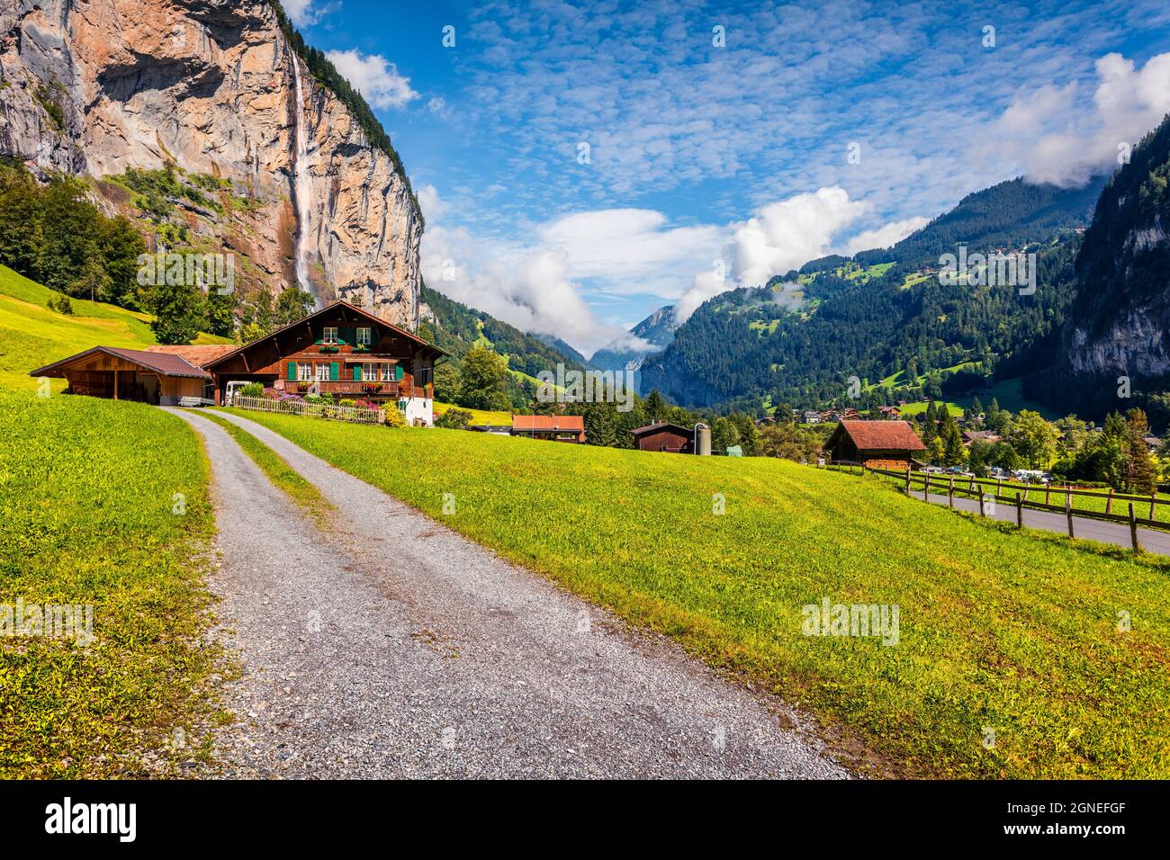 Nice summer view of waterfall in Lauterbrunnen village. Splendid ...