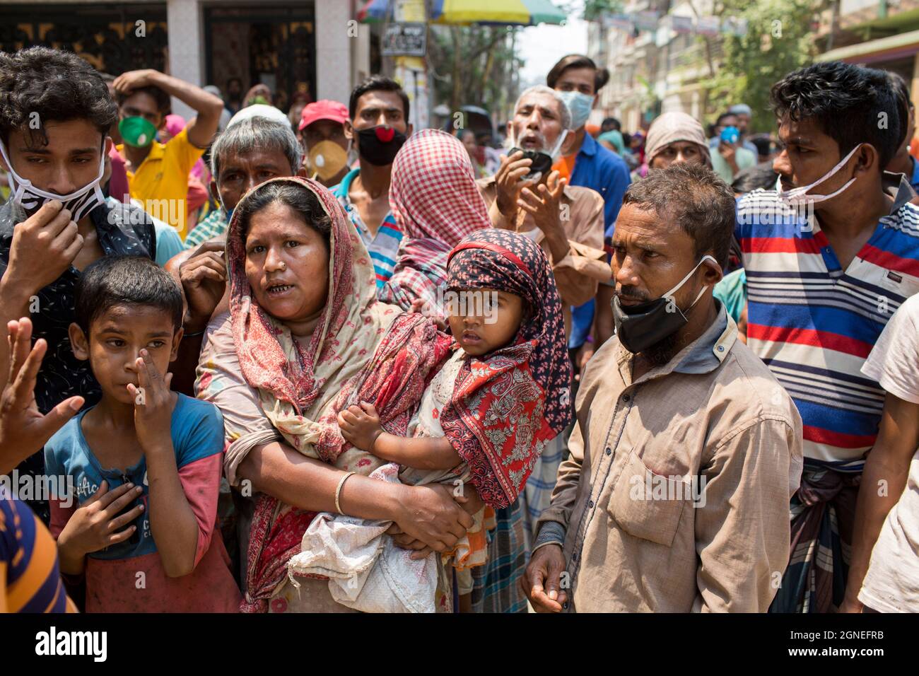 The poor people have gathered to collect relief but they are very ...