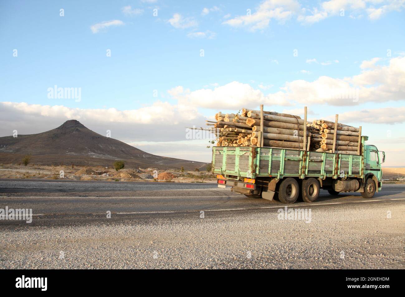 The truck is carrying timber. Timber export and shipping concept Stock ...