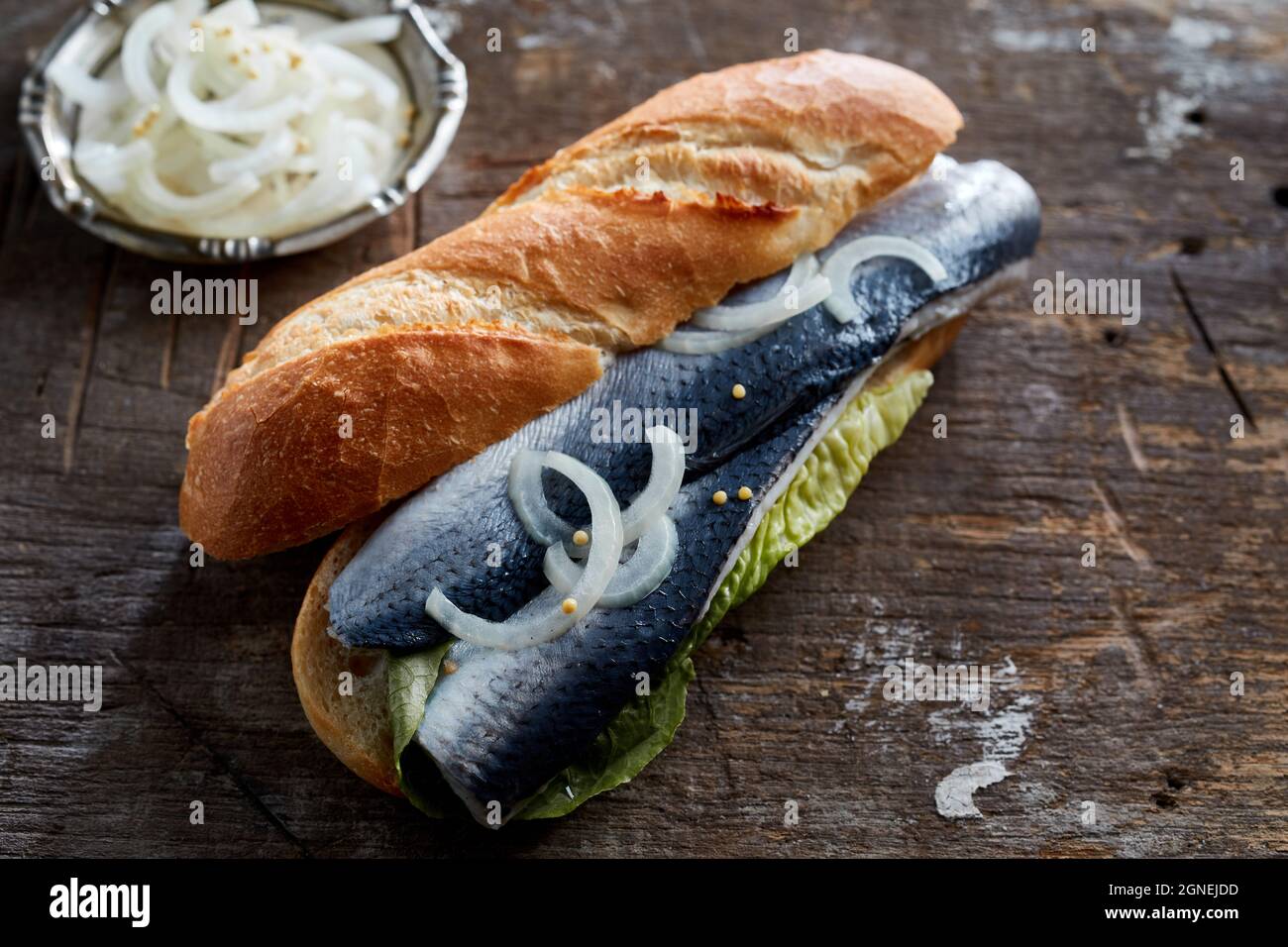 From above of delicious traditional German sandwich Fischbrotchen made ...