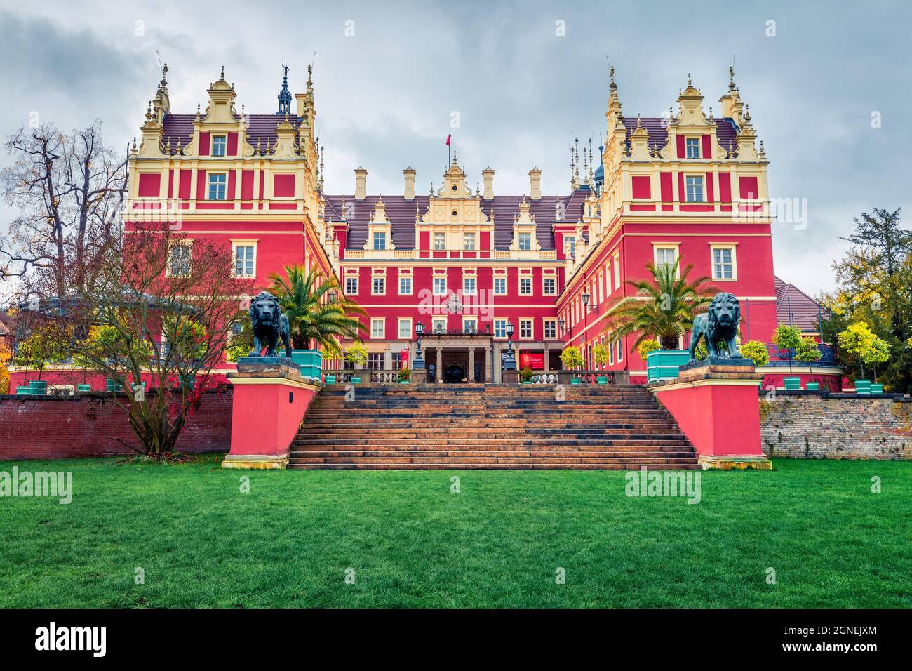 Gorgeous autumn view of Muskau castle. Rainy morning scene in Muskau ...