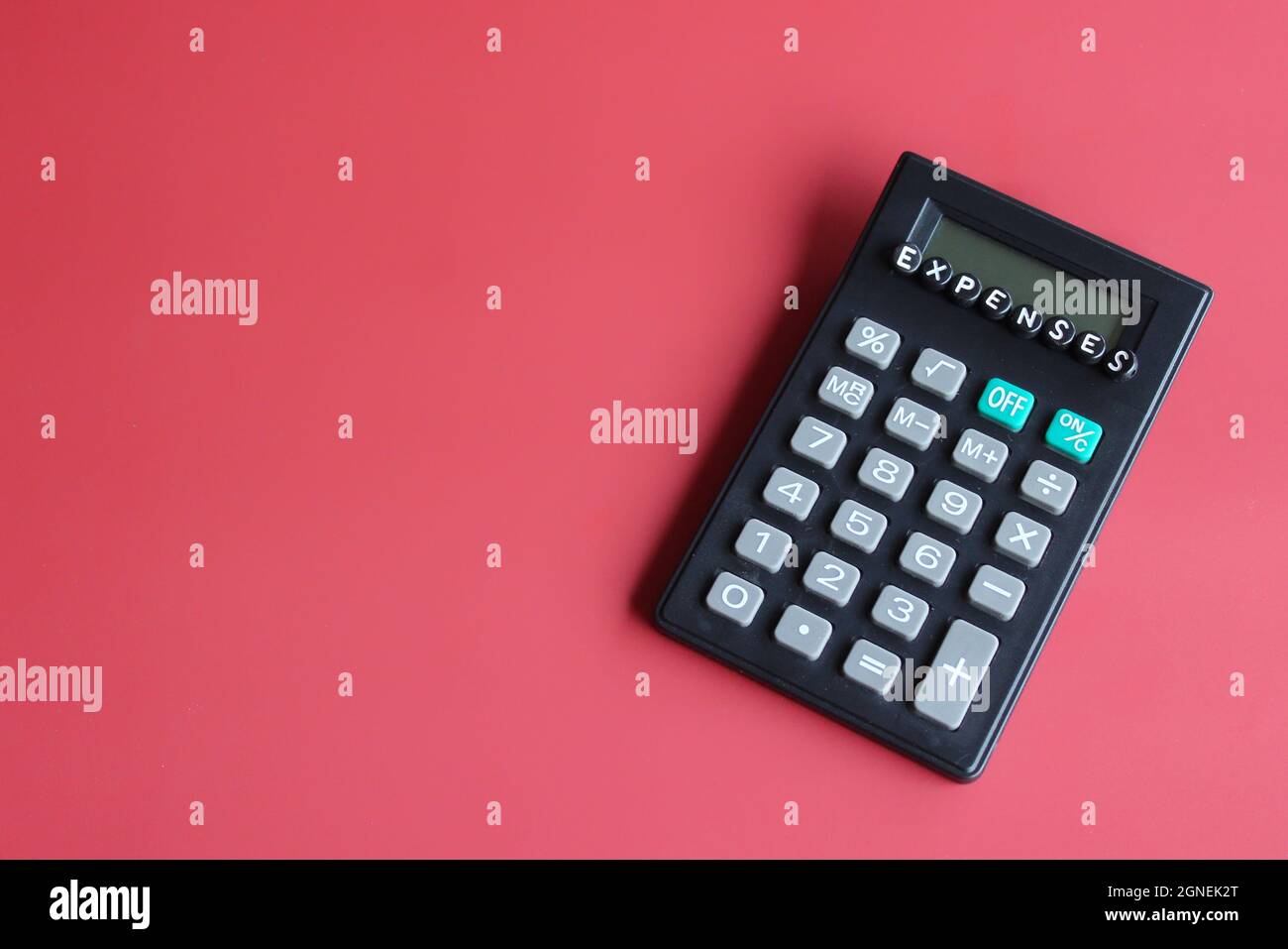 Business and finance concept. Calculator and alphabet beads with text ...