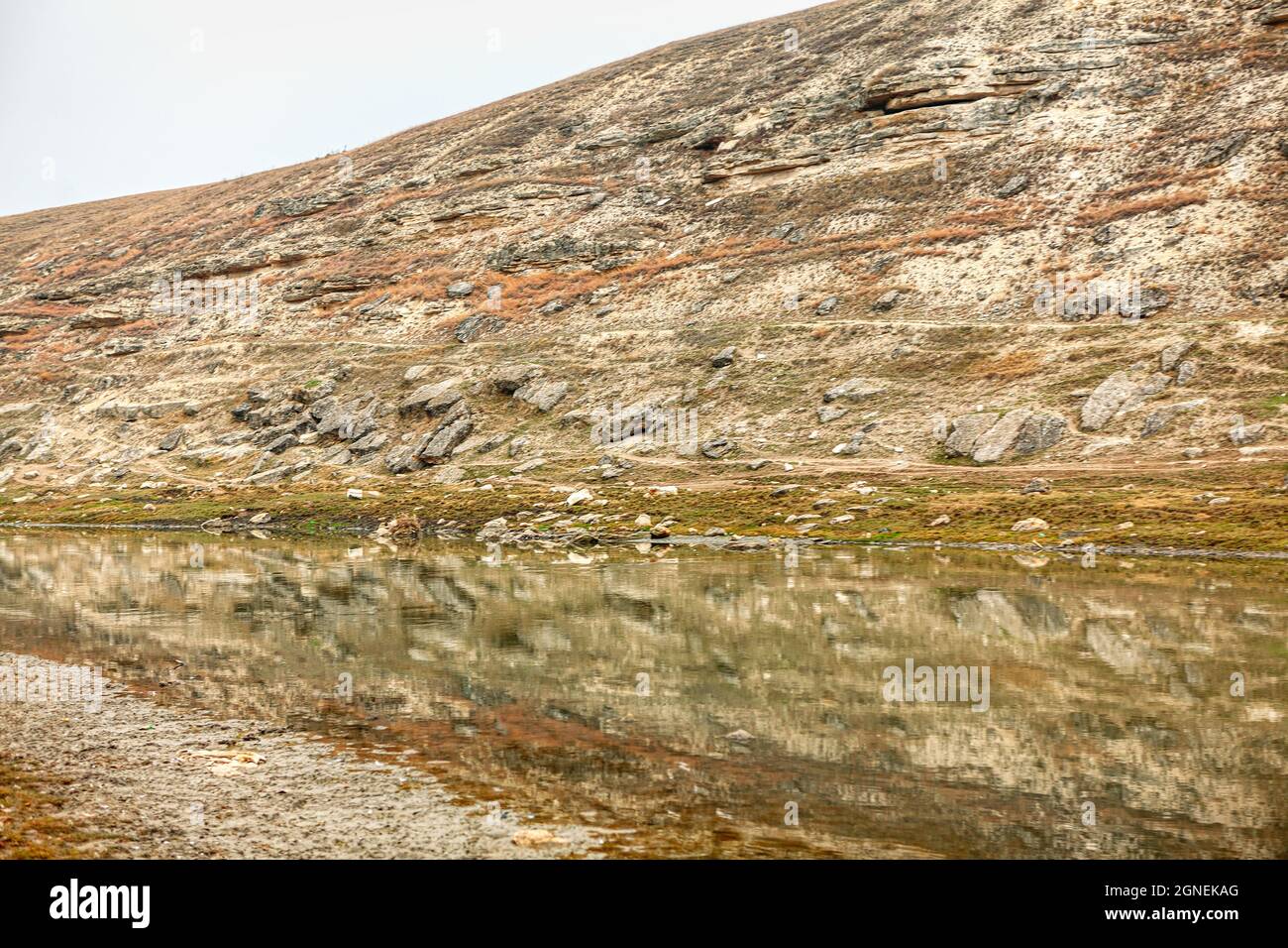 Riverside Rocky hill . Big rocks on the hill Stock Photo - Alamy