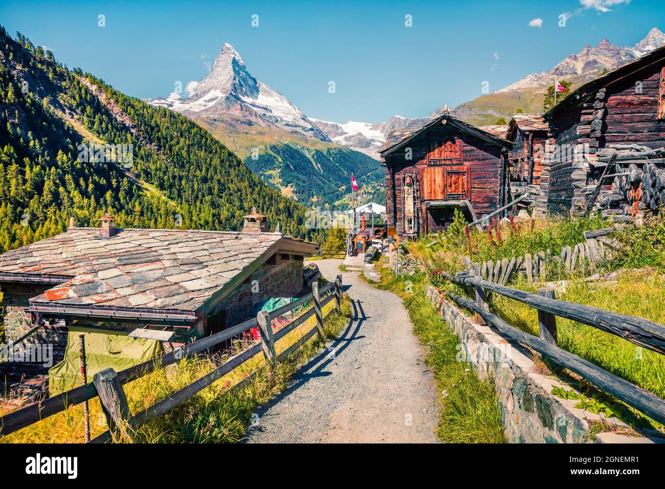 Sunny summer morning in Zermatt village with Matterhorn (Monte Cervino ...