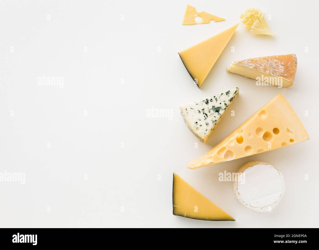 flat lay assortment gourmet cheese with copy space. High quality and ...