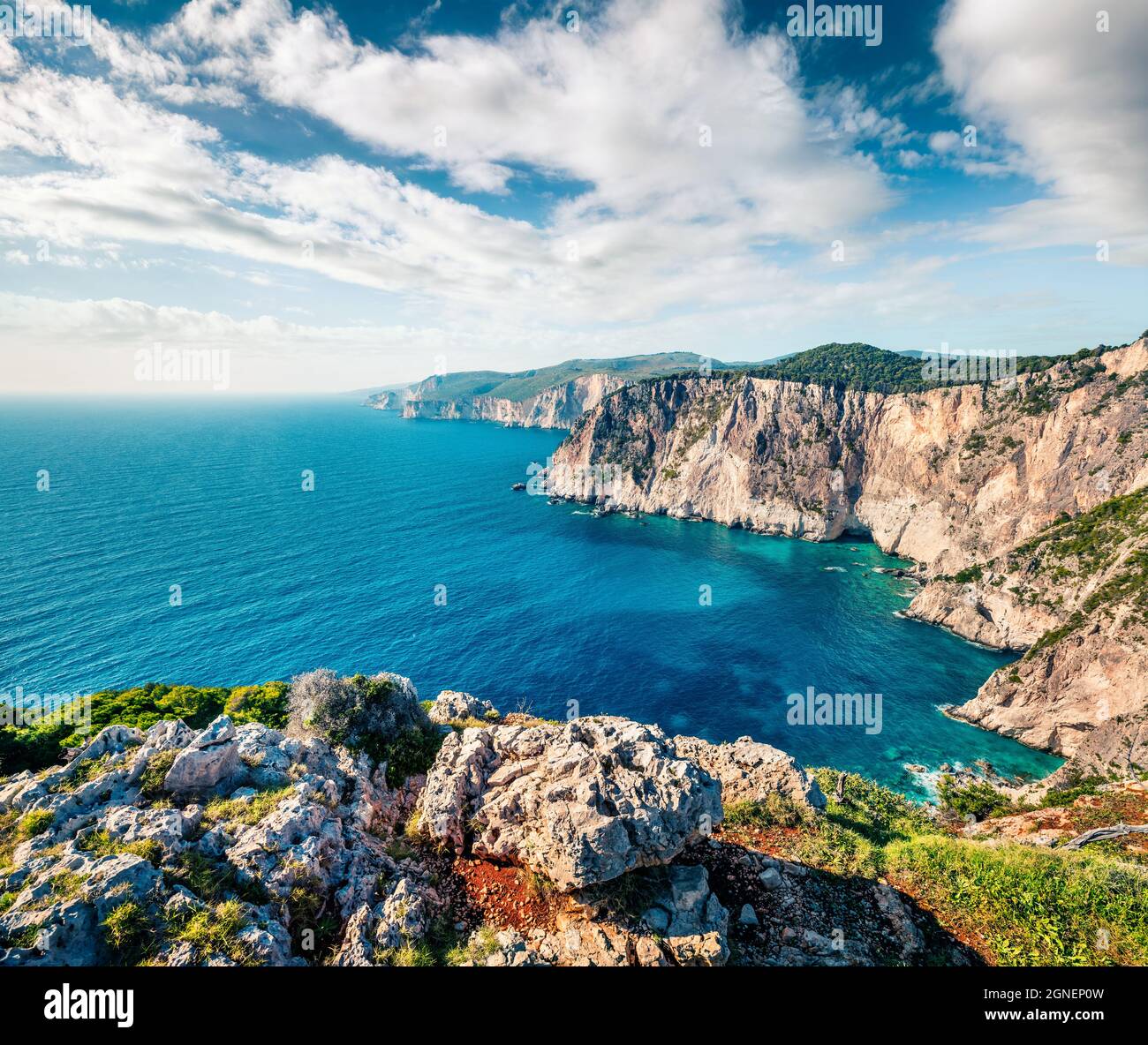 Gorgeous spring view of high cliffs on the Ionian Sea. Colorful morning ...