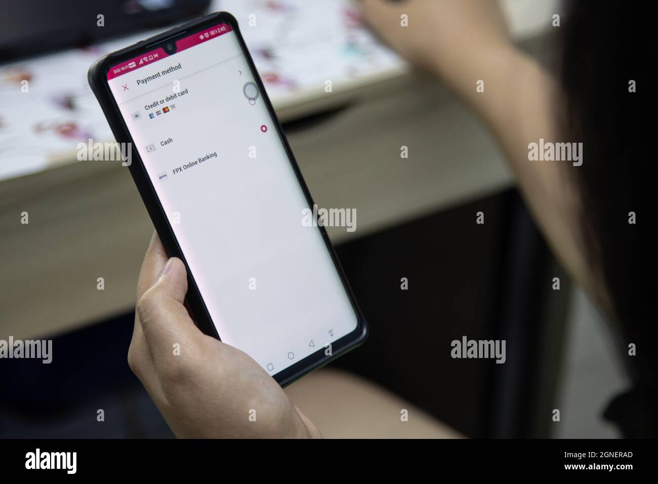 A lady ordering food using FOODPANDA apps. An Application foodpanda ...