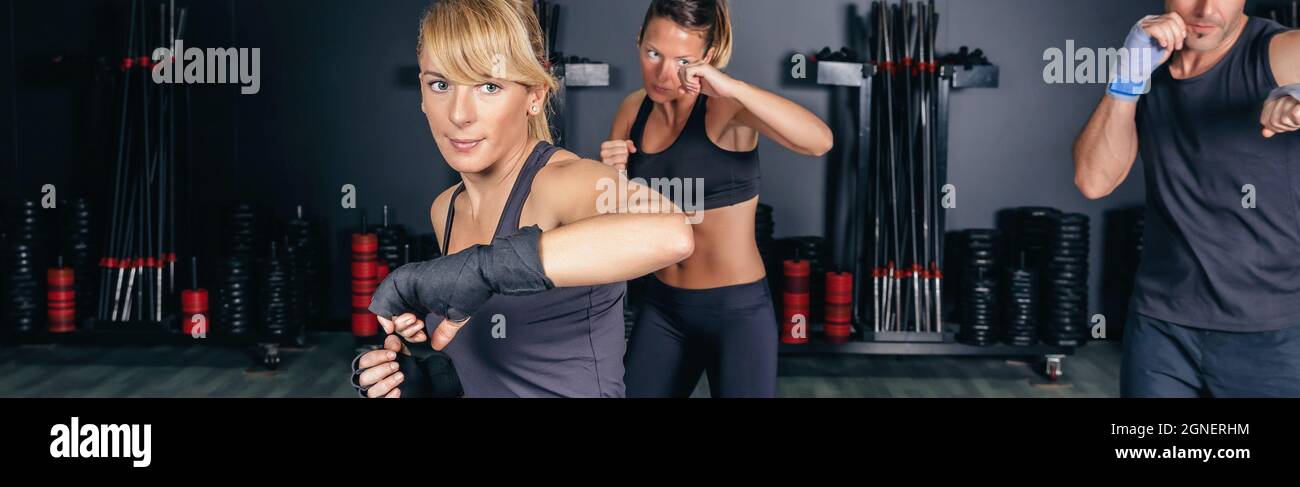 People training boxing in a fitness center Stock Photo - Alamy