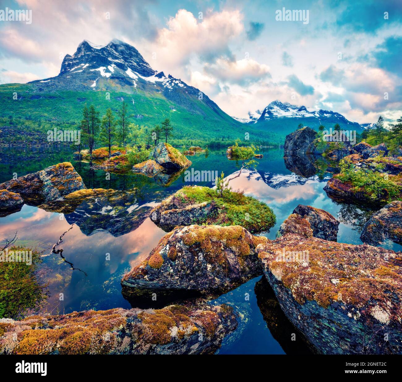 Dramatic summer sunrise on Innerdalsvatna lake. Impressive morning ...