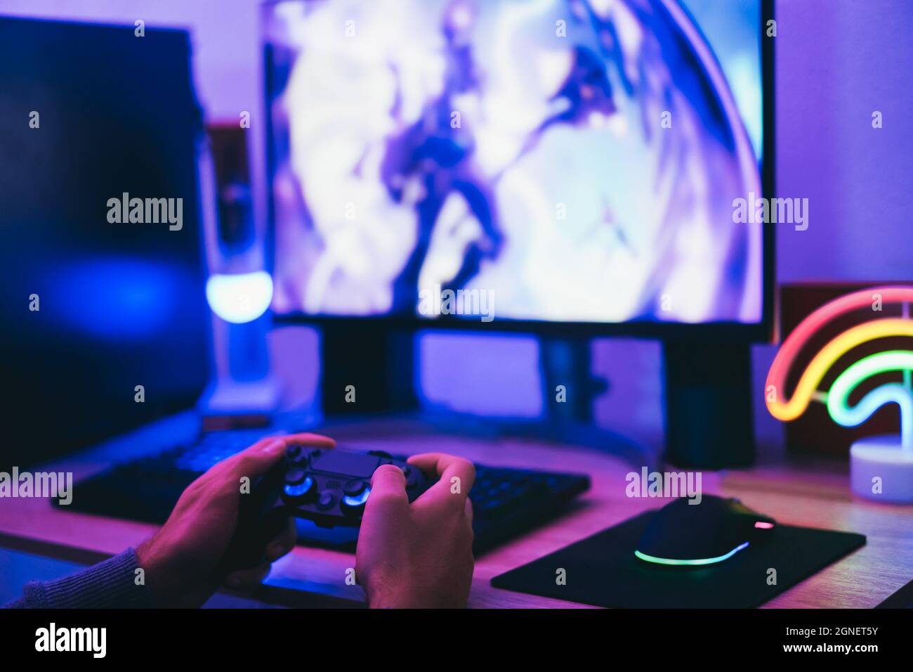 Boy gamer playing strategy game online - Focus on right hand holding ...