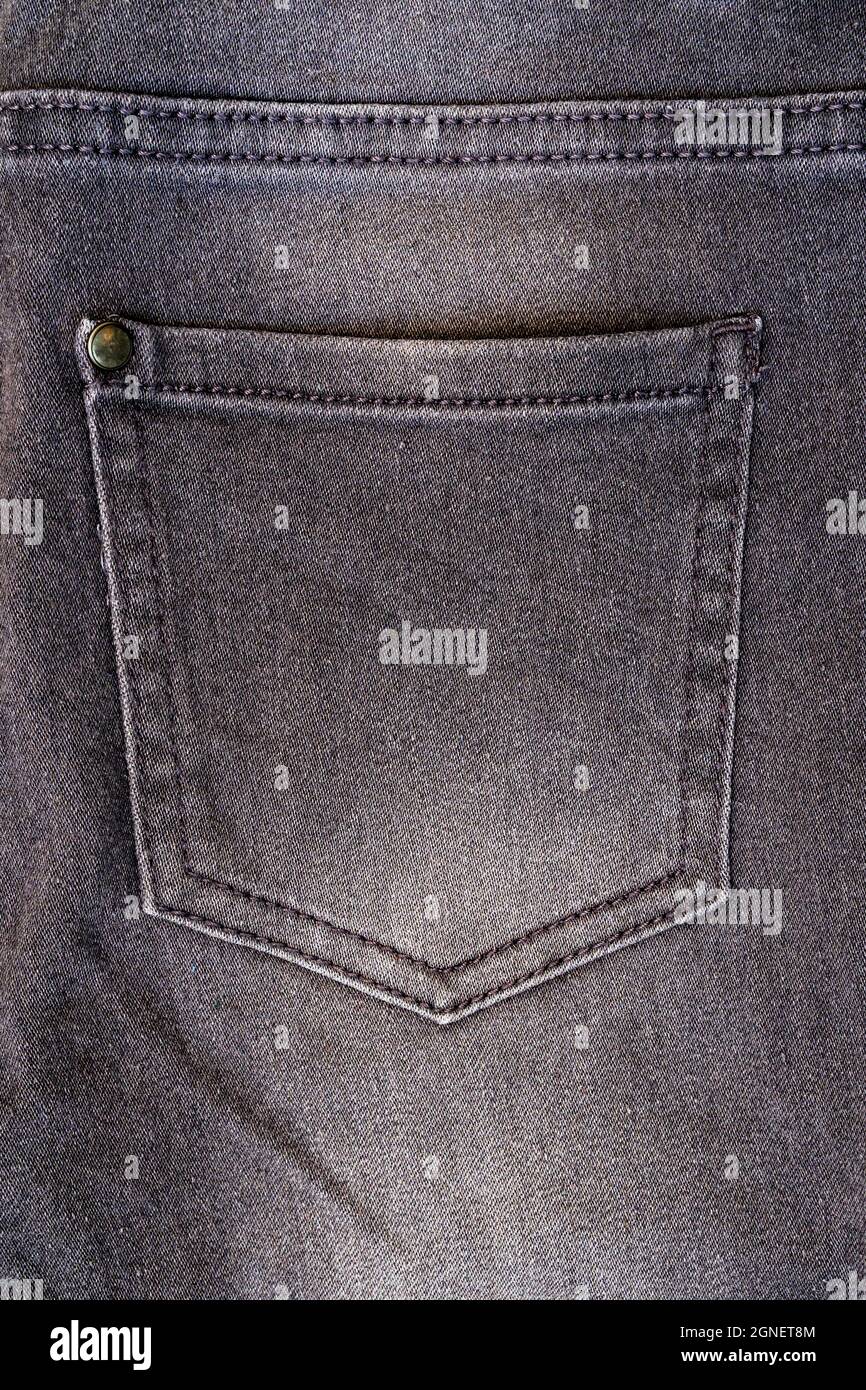 Black jeans denim texture - back view pocket Stock Photo - Alamy