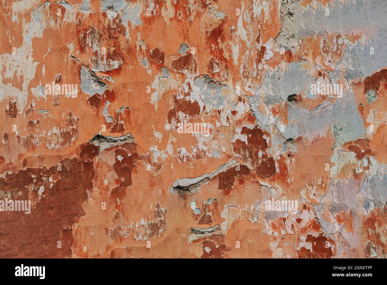 Multicolored background:concrete surface with peeling and cracked brown ...