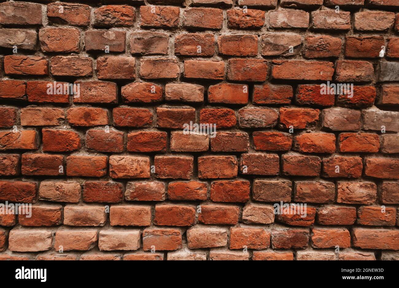 The texture of an old brick wall with natural defects. Scratches ...