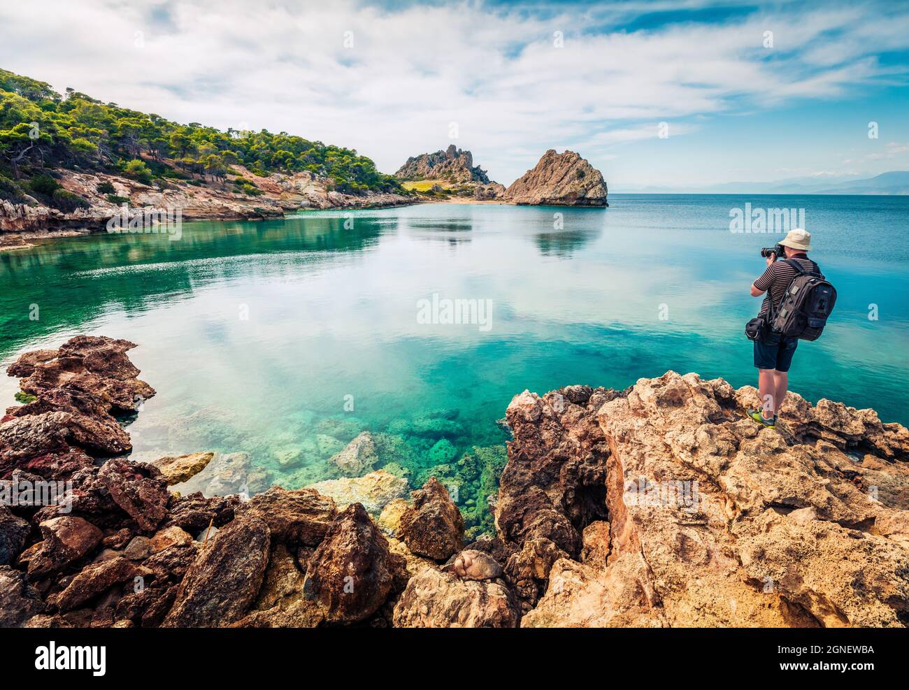 Photographer take picture of cozy beach in northeastern Corinthia ...