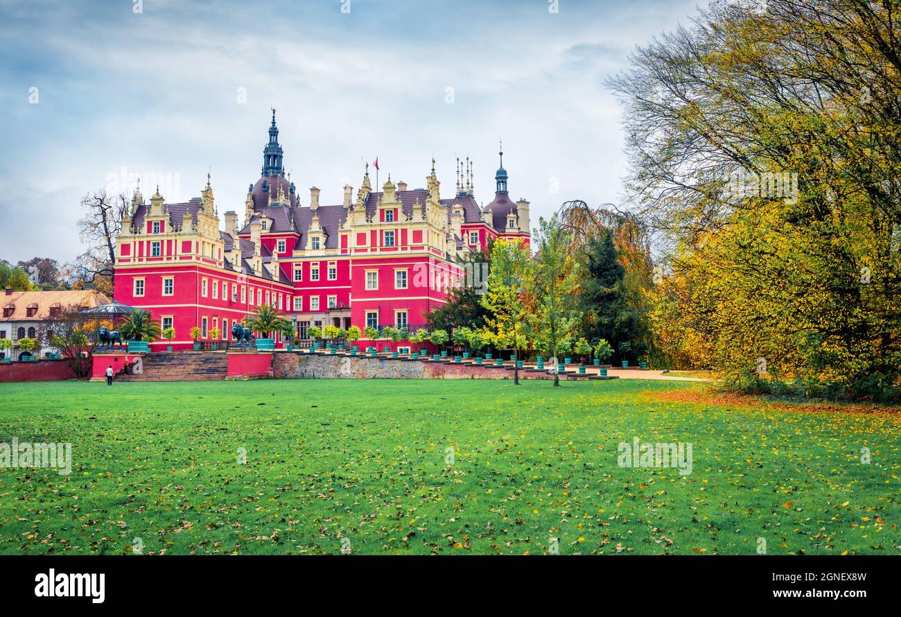 Attractive autumn view of Muskau castle. Rainy morning scene in Muskau ...