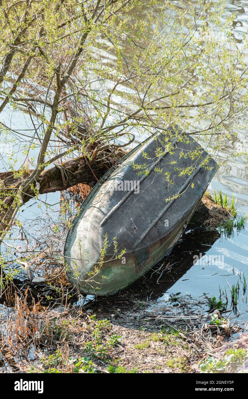 Overturned sail boat hi-res stock photography and images - Alamy