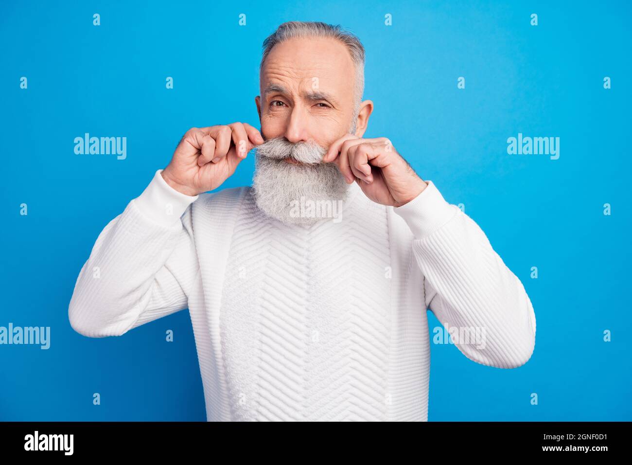 Portrait of satisfied person hands touch moustache look camera wear ...