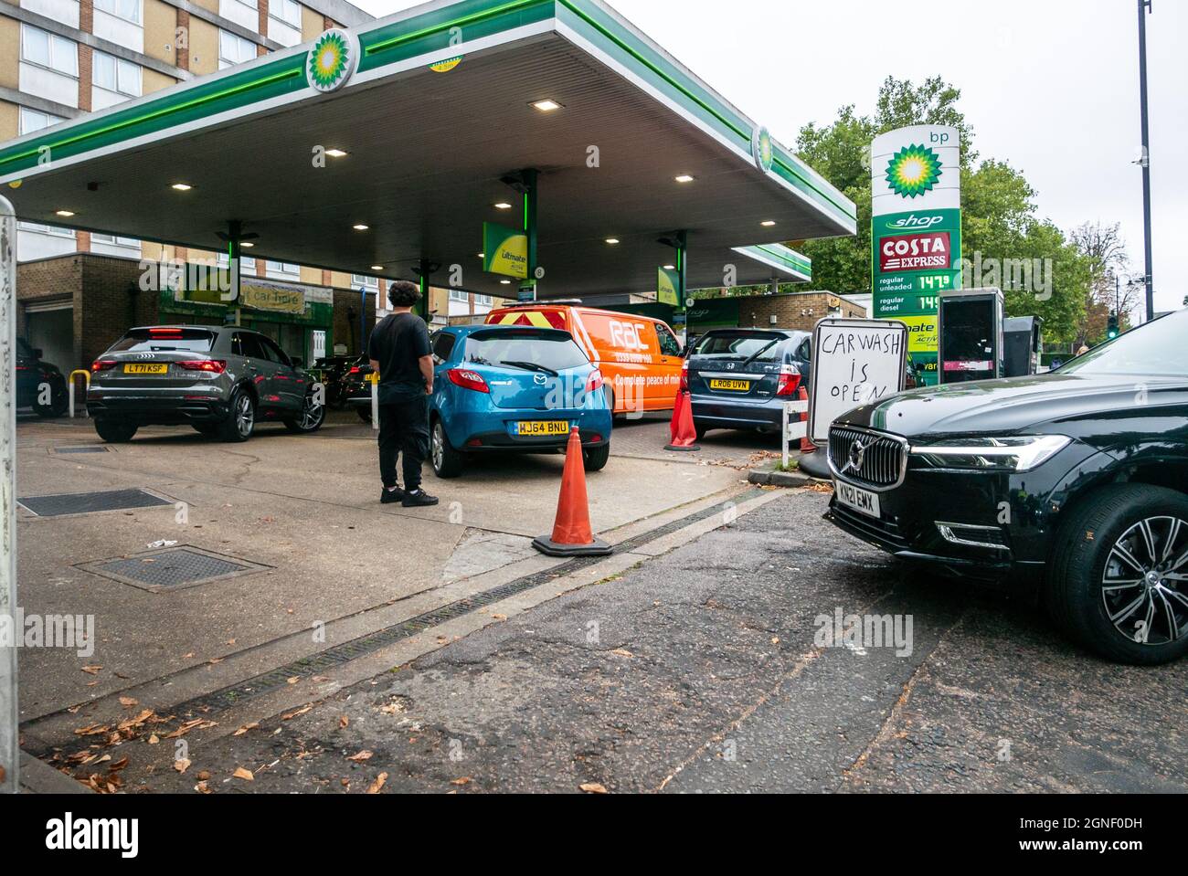 Large queues of car traffic outside BP petrol station Hampstead, London ...