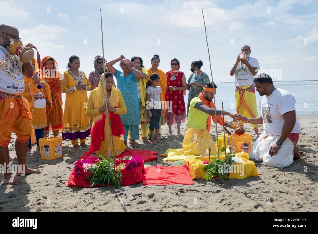 Hindu worshippers make offerings to their gods & goddesses at a Ganga ...