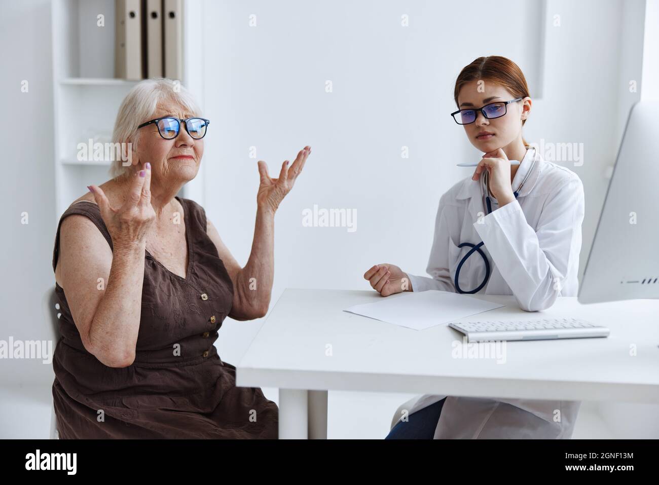 doctor and patient conversation with the patient hospital office Stock ...