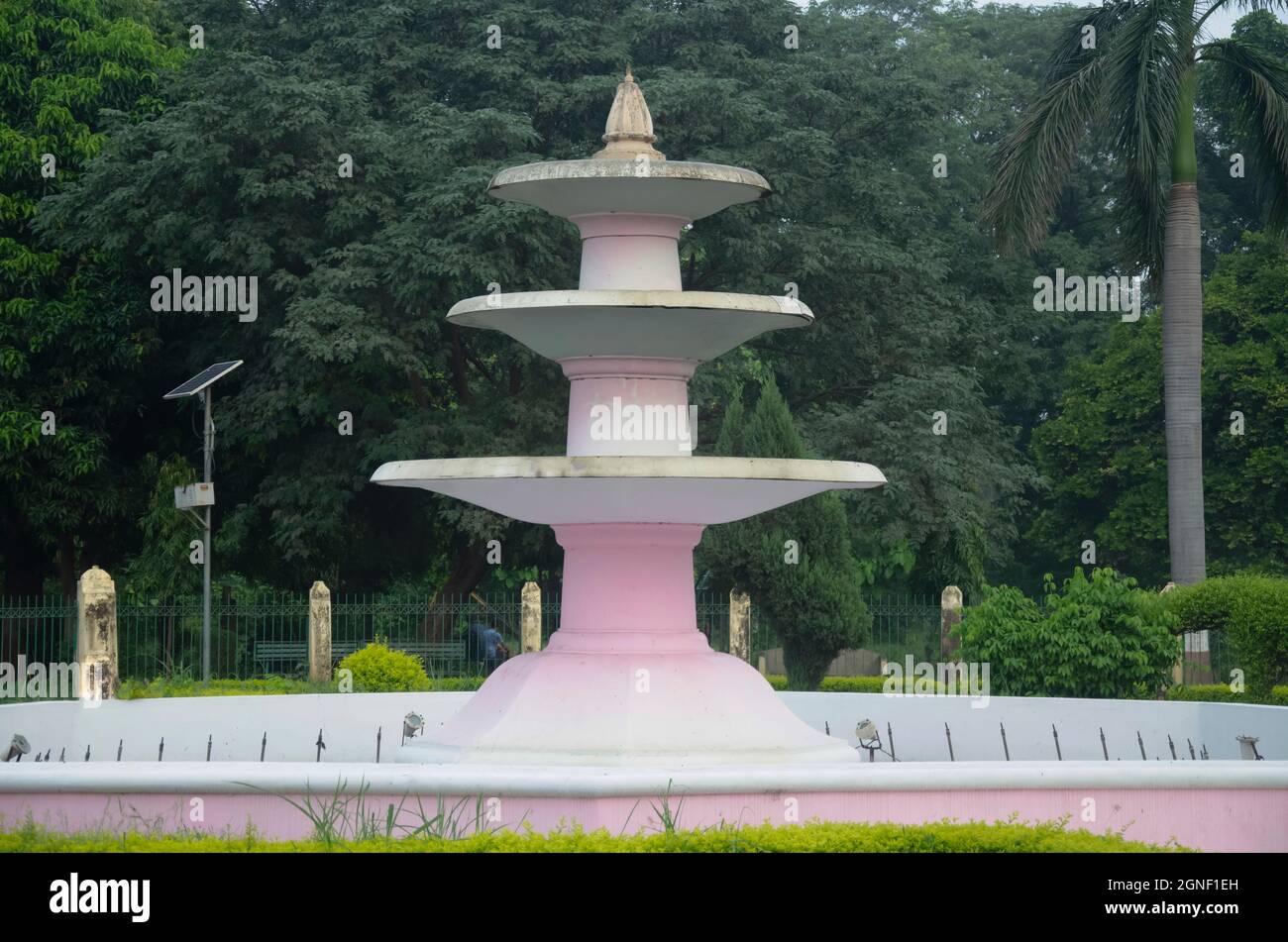 Beautiful rounded fountain in the park . fountain made with concrete ...