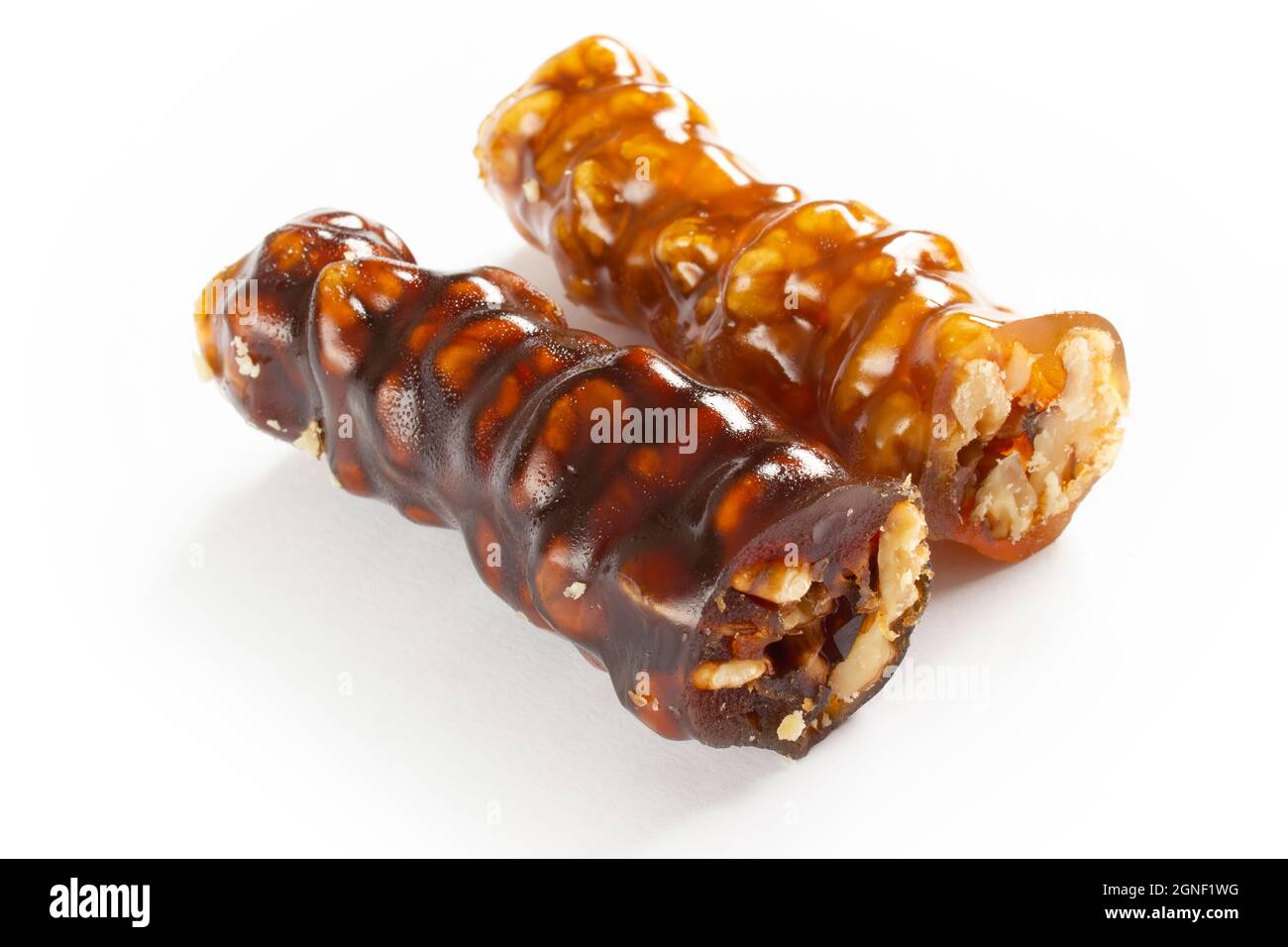 Walnuts on a string dipped in starch grape molasses. Churchkhela ...
