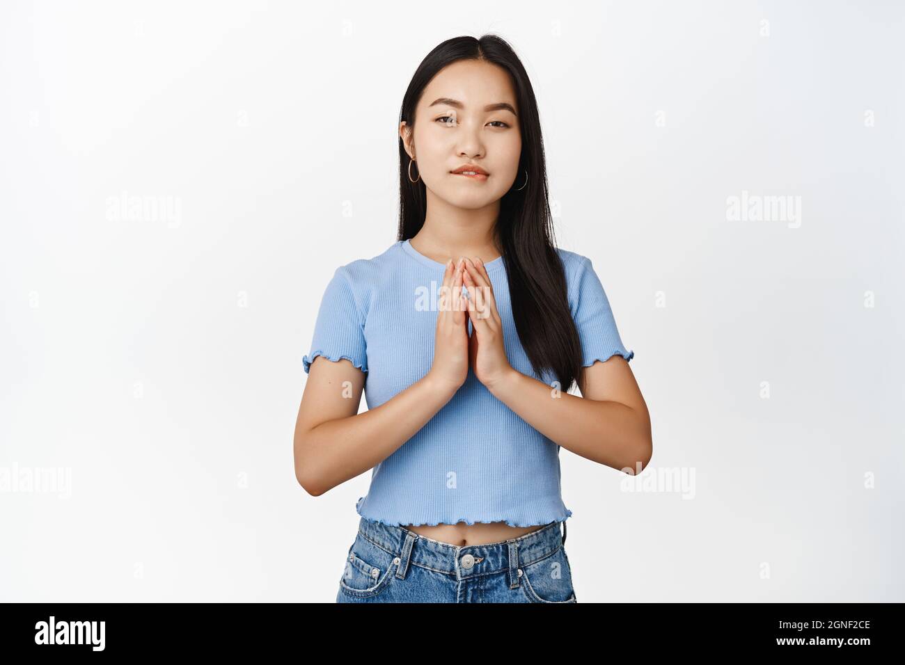 Greedy asian girl scheming, steeple fingers and squinting coy, having ...