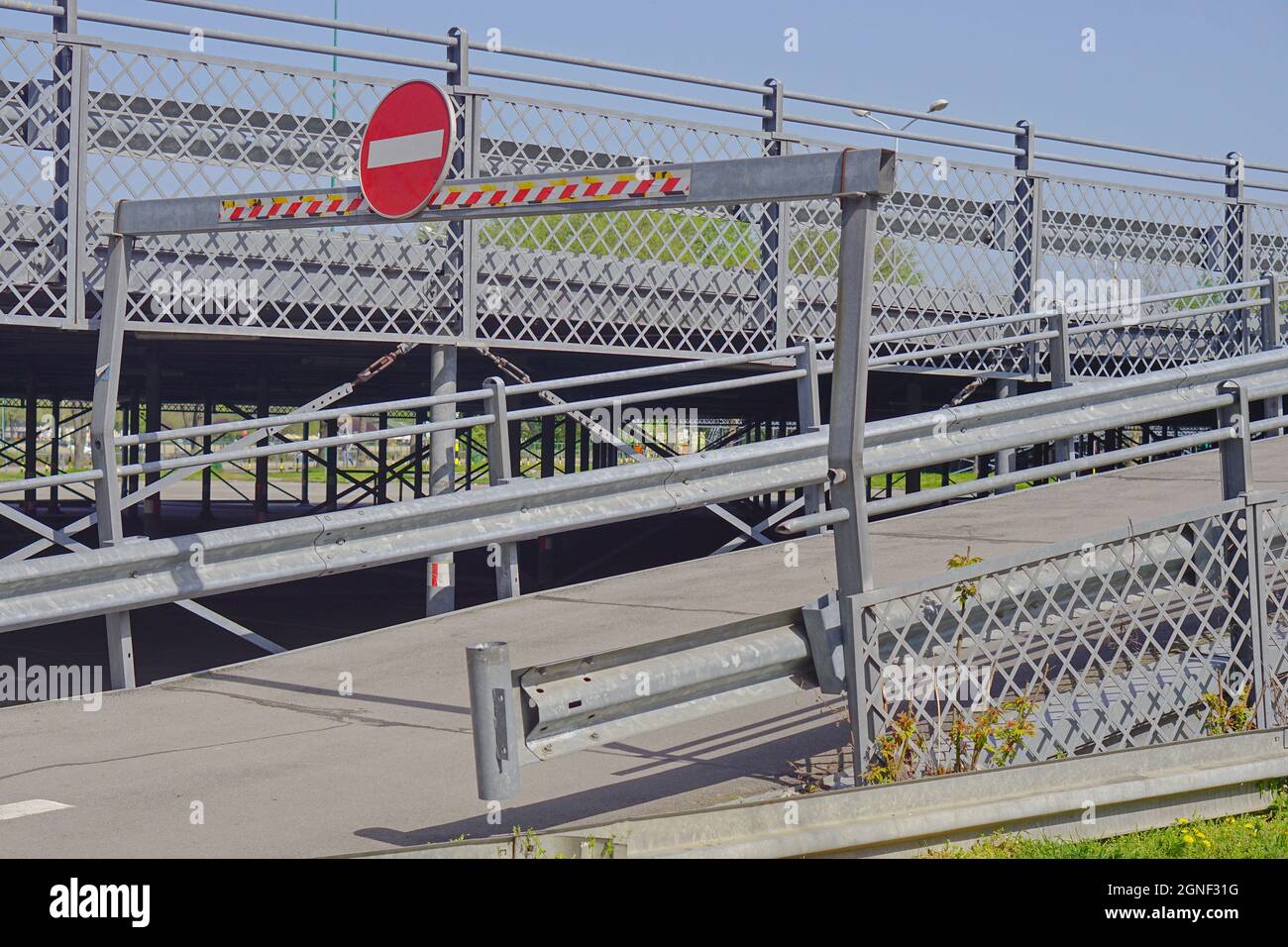 Exit ramp from second level parking no entry sign Stock Photo - Alamy
